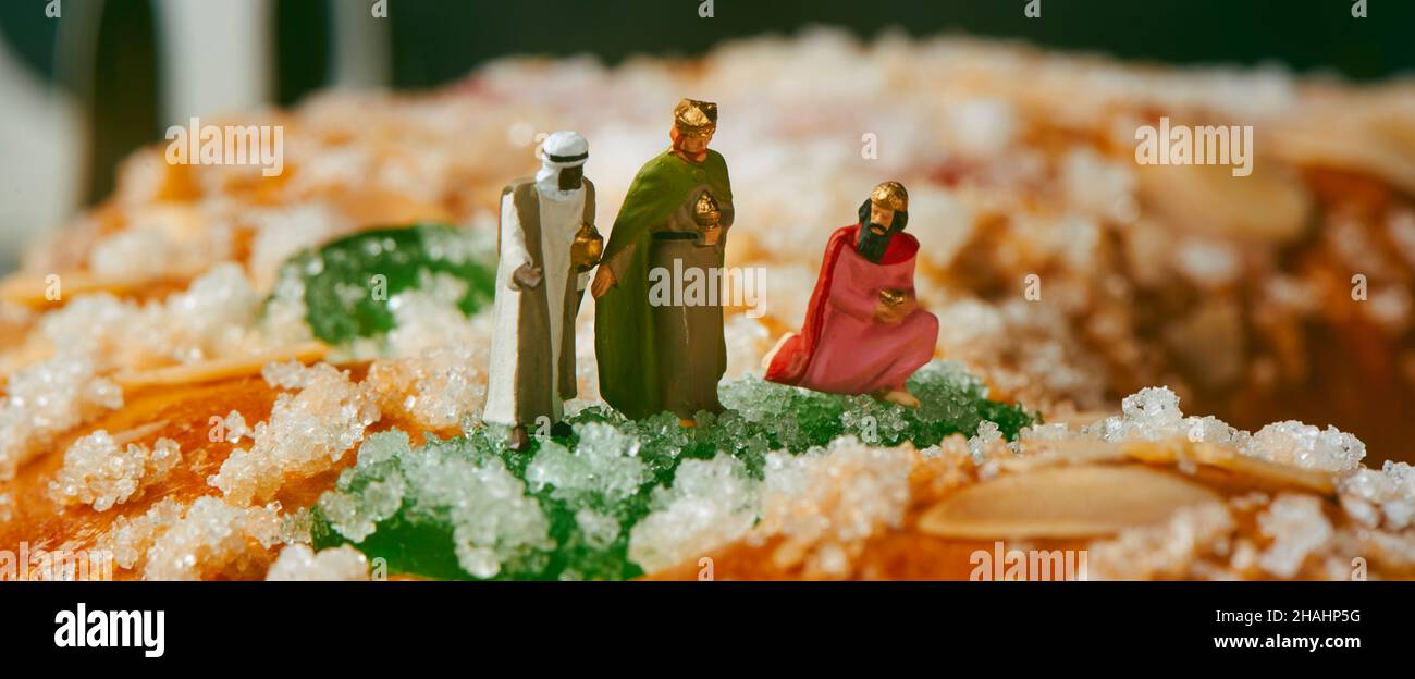 the three kings, melchior, caspar and balthazar, on top of a roscon de ...