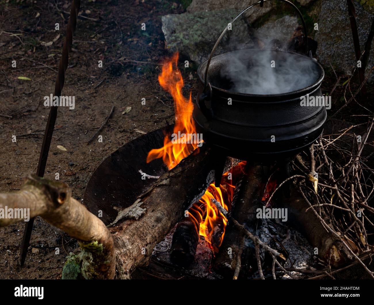 medieval reenactment, camp kitchen with cauldron, open steaming hot ...