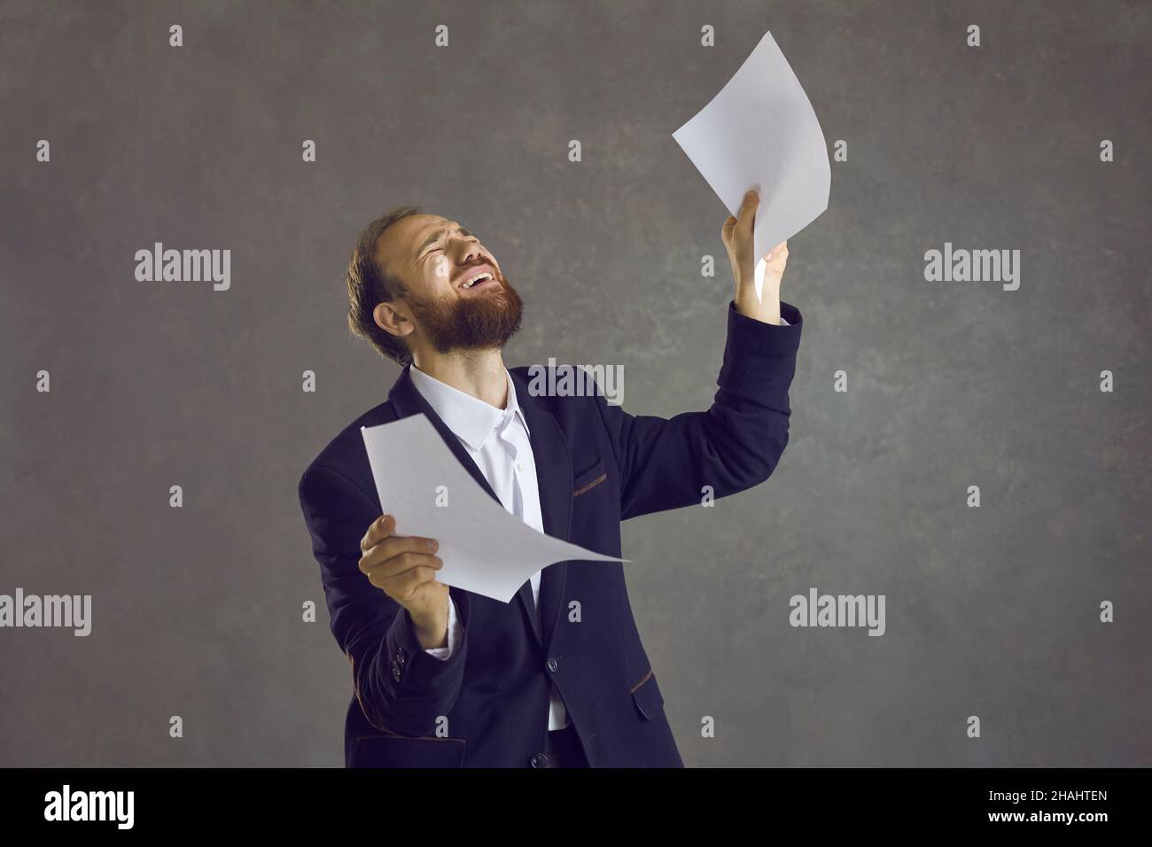 Man raised arms standing on hi-res stock photography and images - Alamy