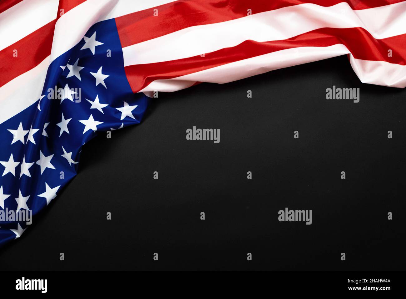 United States wave flag on black background photo Stock Photo - Alamy