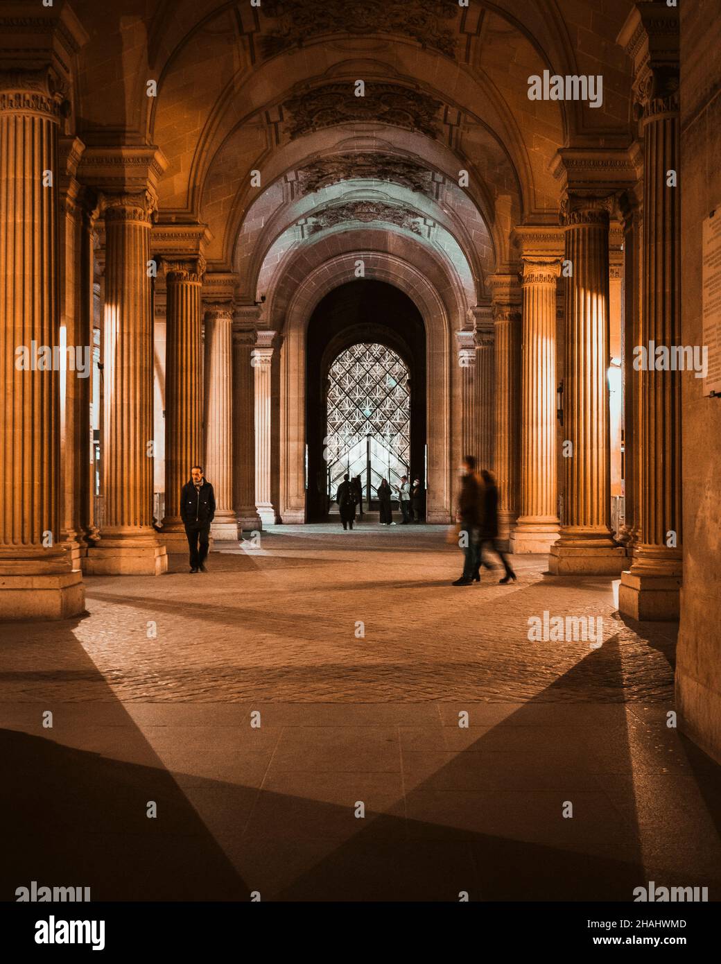 Archway to Louvre entrance at night, Paris, France Stock Photo - Alamy