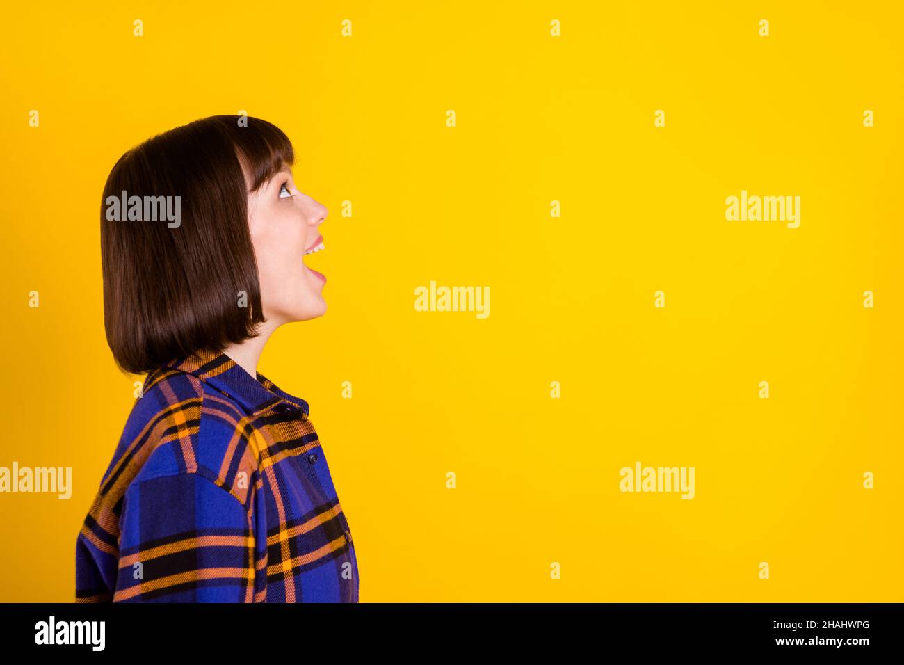 Profile side view portrait of attractive cheerful amazed girl looking ...