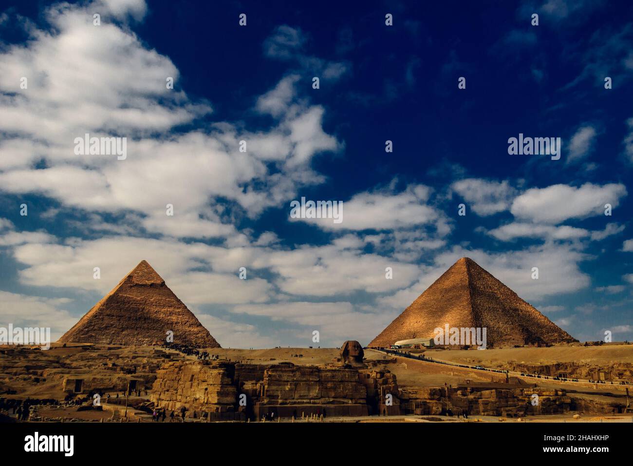 Pyramids of Giza, Egypt under the cloudy sky Stock Photo - Alamy