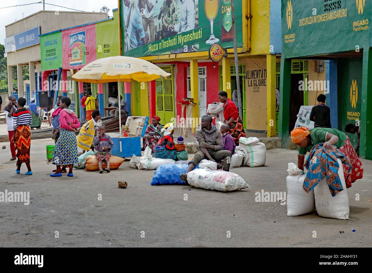 RUBAVU, RWANDA - Nov 16, 2018: Colorful shops along the main road, busy ...