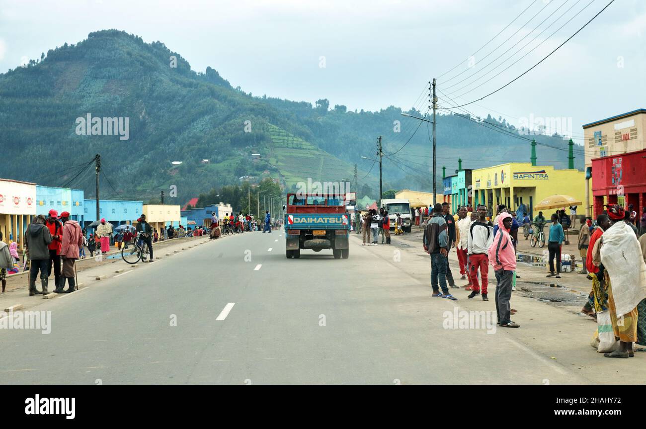 RUBAVU, RWANDA - Nov 16, 2018: Colorful shops along the main road, busy ...