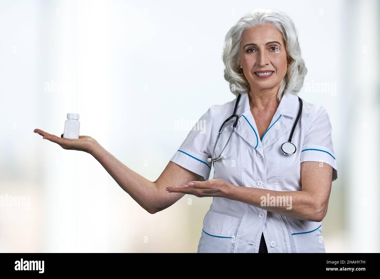 Doctor presenting medication physician hi-res stock photography and ...