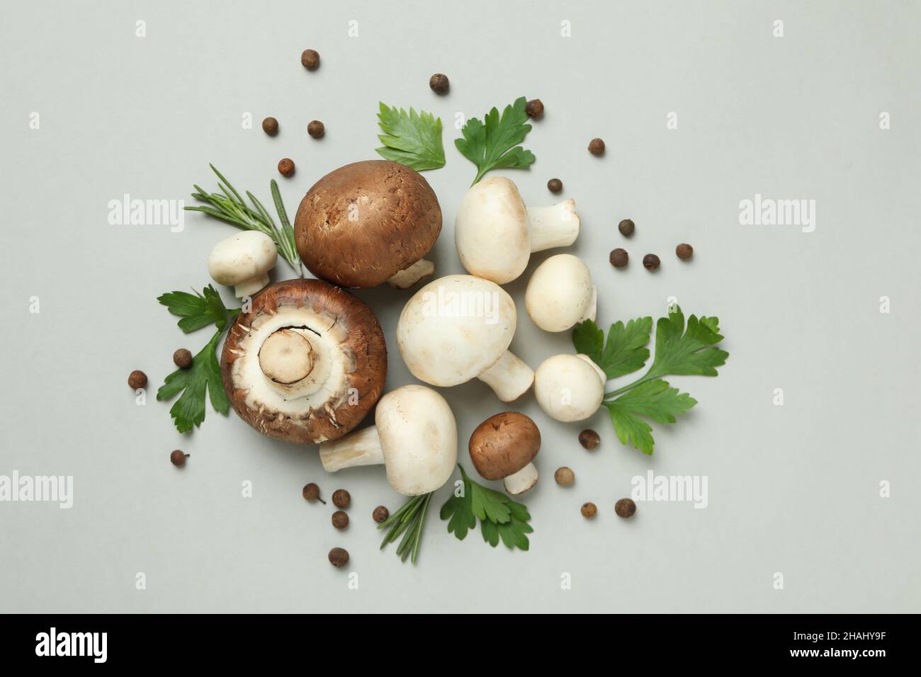 Concept of tasty food with champignon on light Stock Photo - Alamy