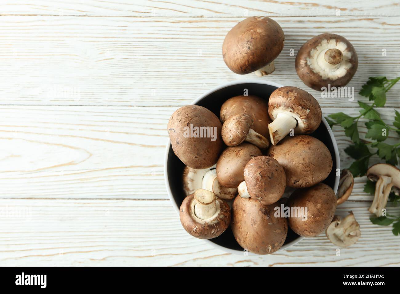 Concept of tasty food with champignon on white Stock Photo - Alamy