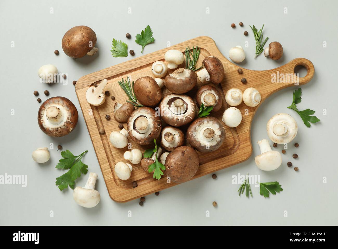 Concept of tasty food with champignon on white Stock Photo - Alamy