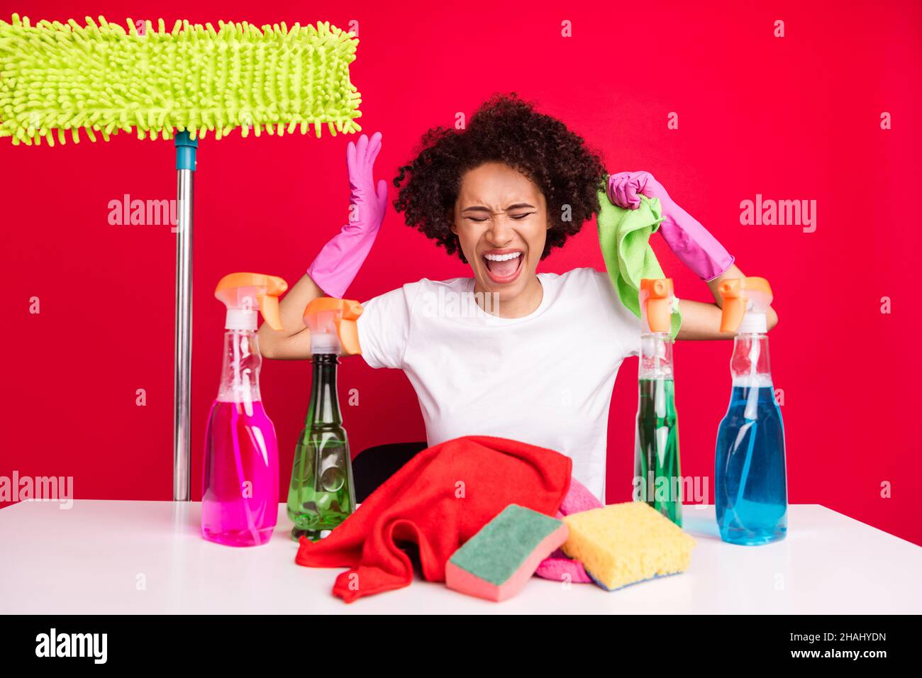 Photo portrait woman angry shouting crazy near cleaning equipment ...