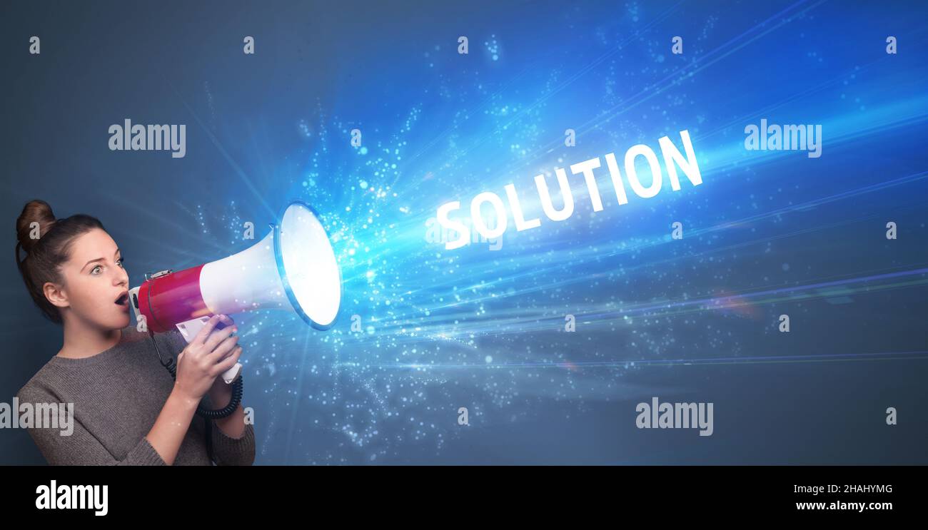 Young person shouting in loudspeaker Stock Photo - Alamy
