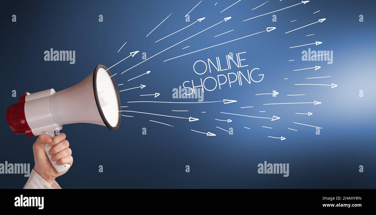 Young girl screaming to megaphone Stock Photo - Alamy