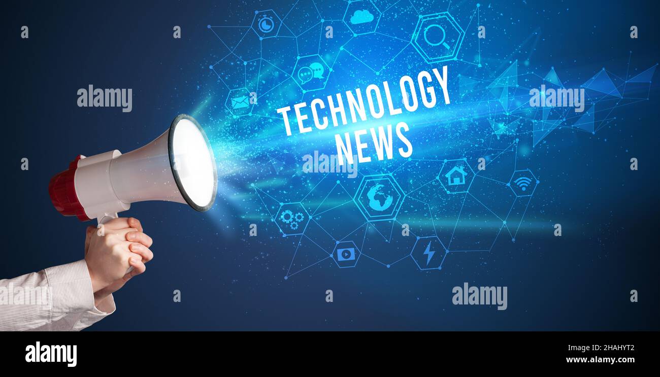 Young woman shouting in megaphone, technology announcement concept ...