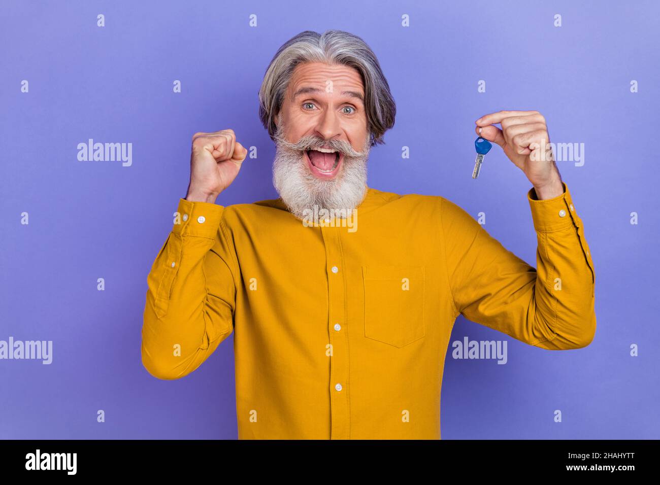 Photo of excited cheerful senior man rejoice purchase new home ...