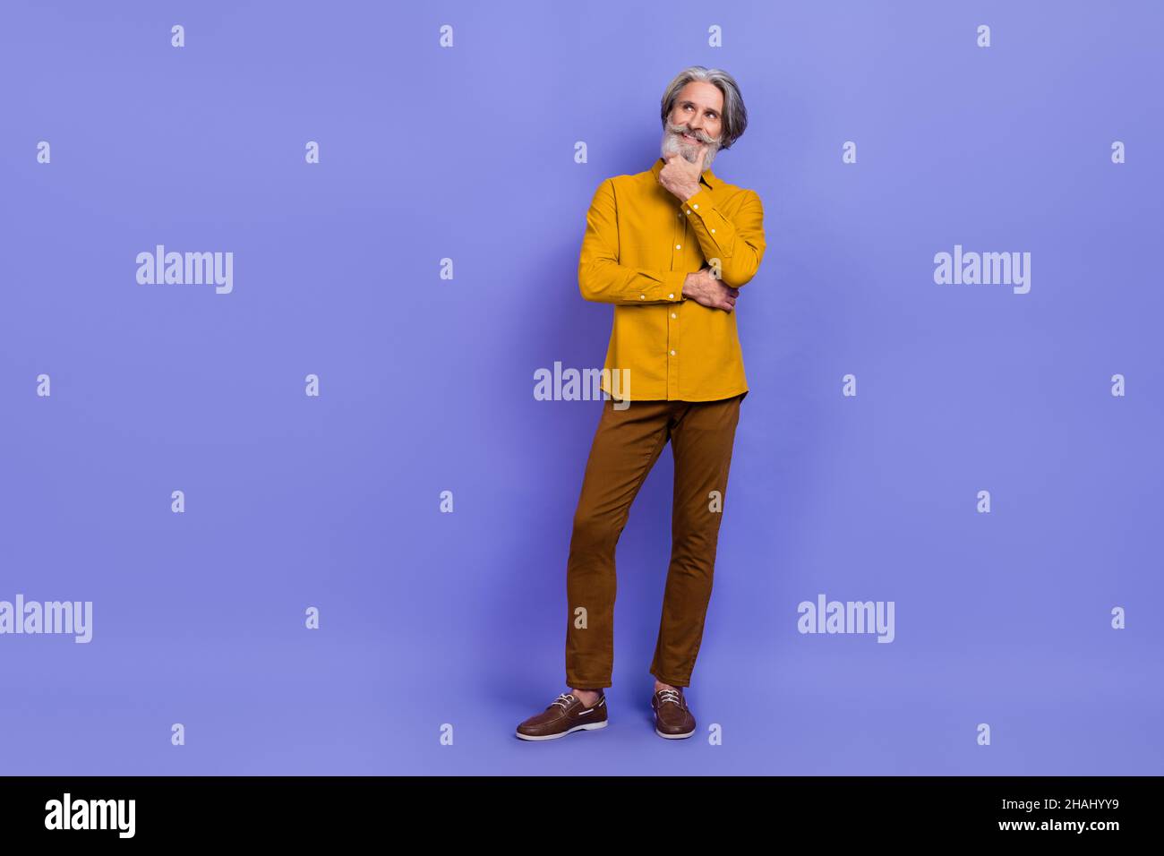Full body photo of aged man hand touch chin wonder look empty space ...