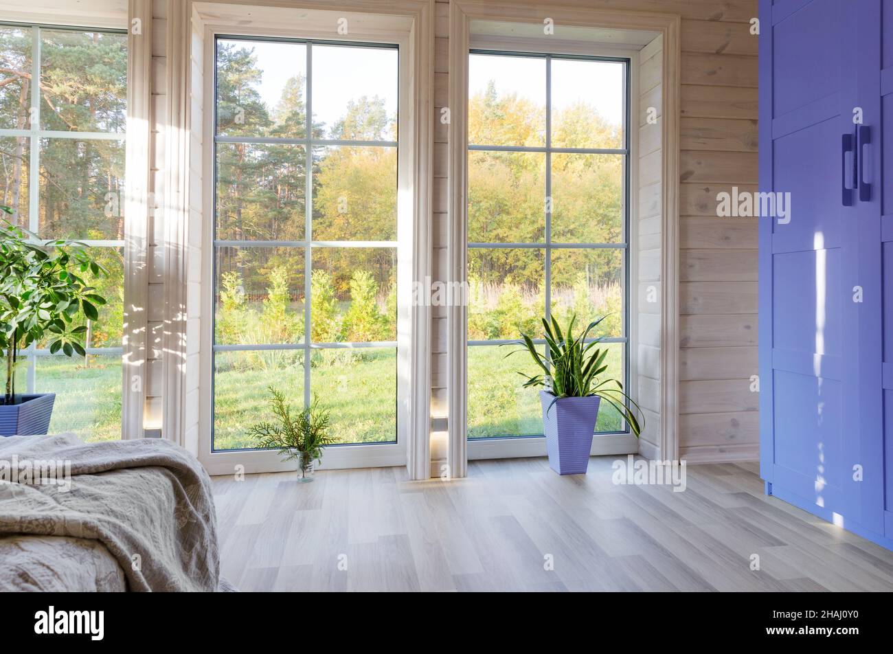 Bright interior, room in wooden house with large window. Scandinavian ...