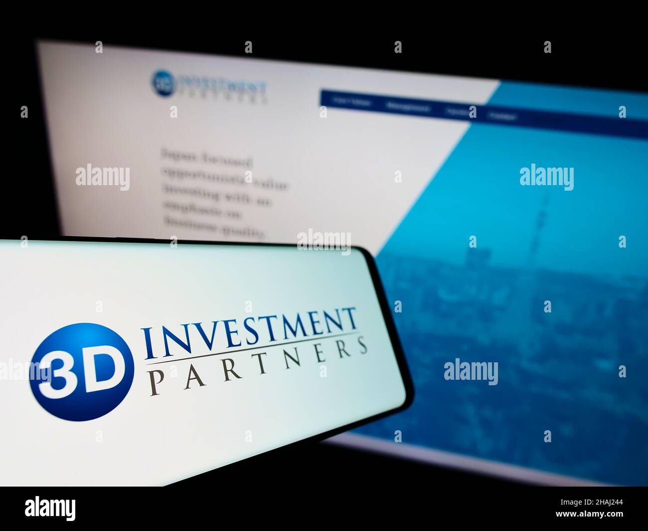 Mobile phone with logo of Singaporean company 3D Investment Partners ...