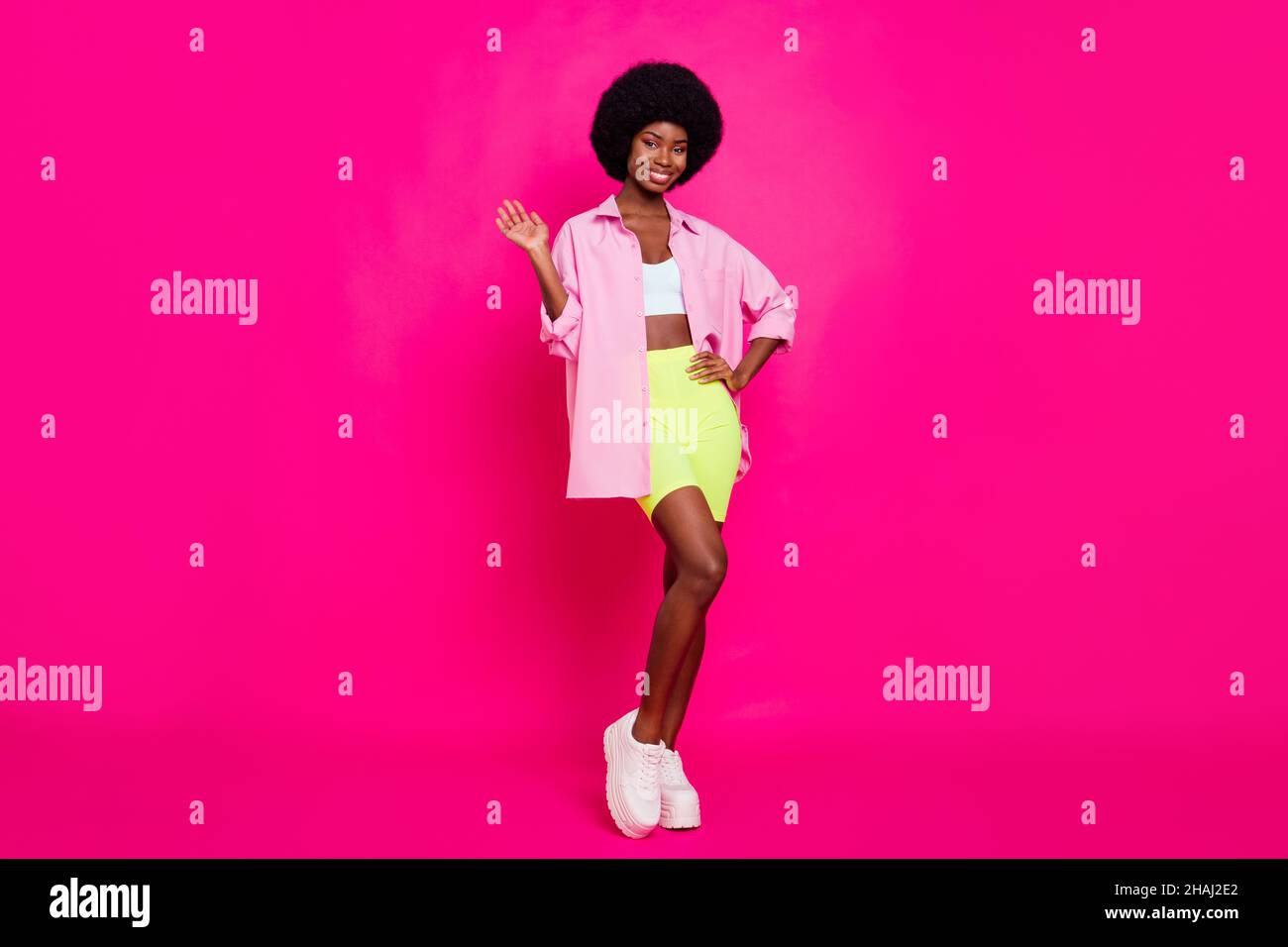Photo of sweet charming dark skin woman dressed crop top smiling waving ...