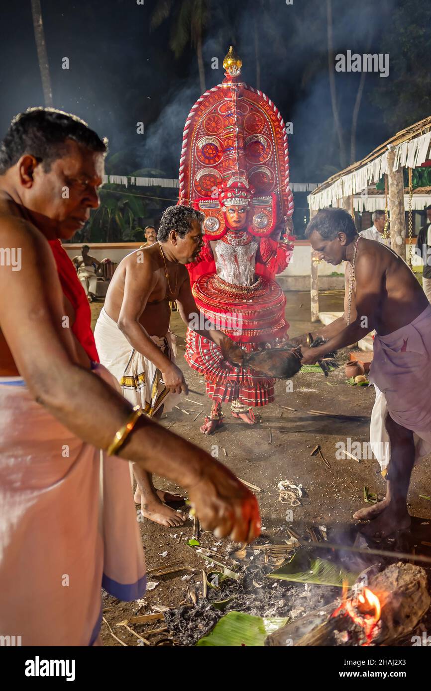 Theyyam artist perform during temple festival in Payyanur, Kerala ...