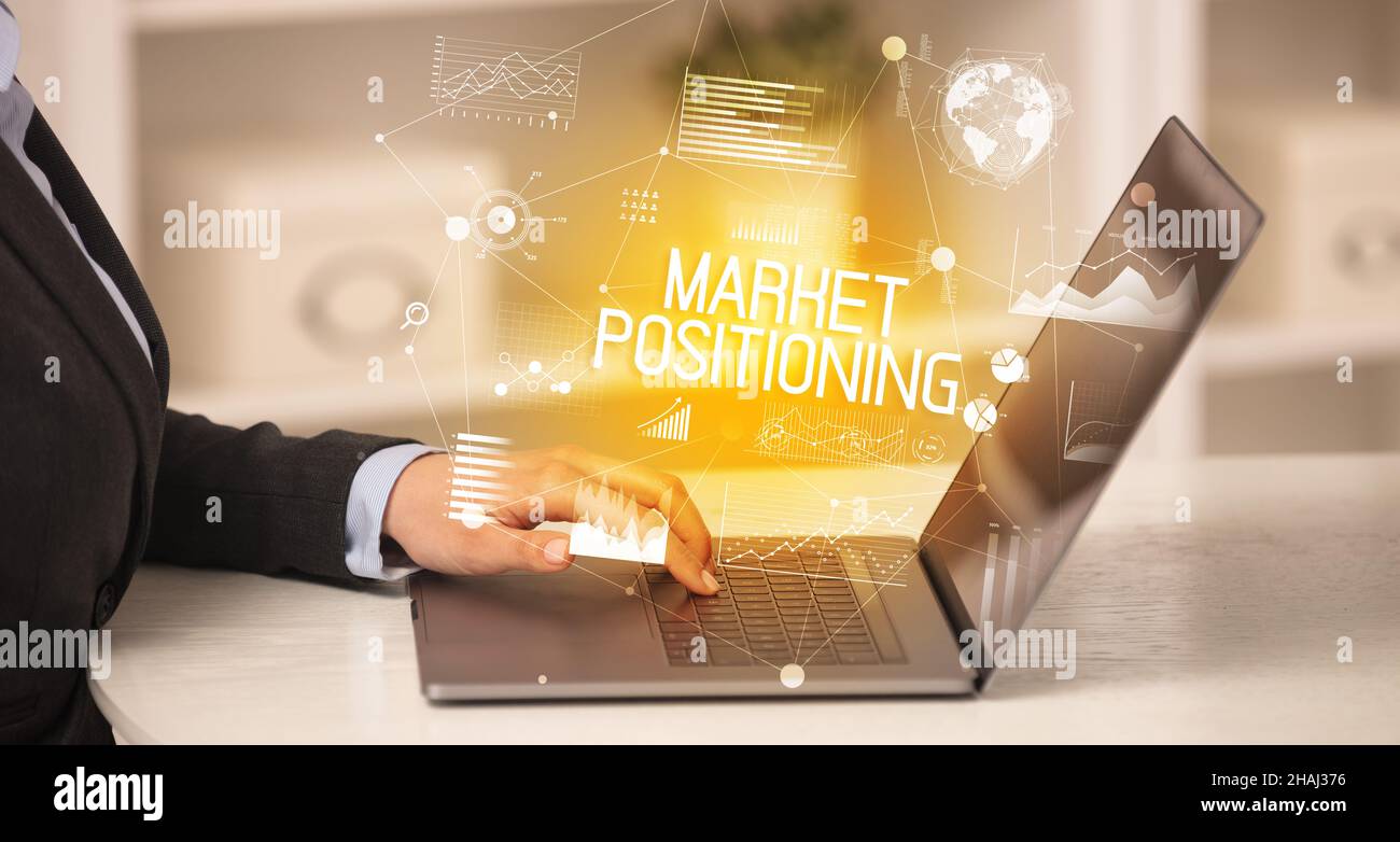 Side view of a business person working on laptop Stock Photo - Alamy