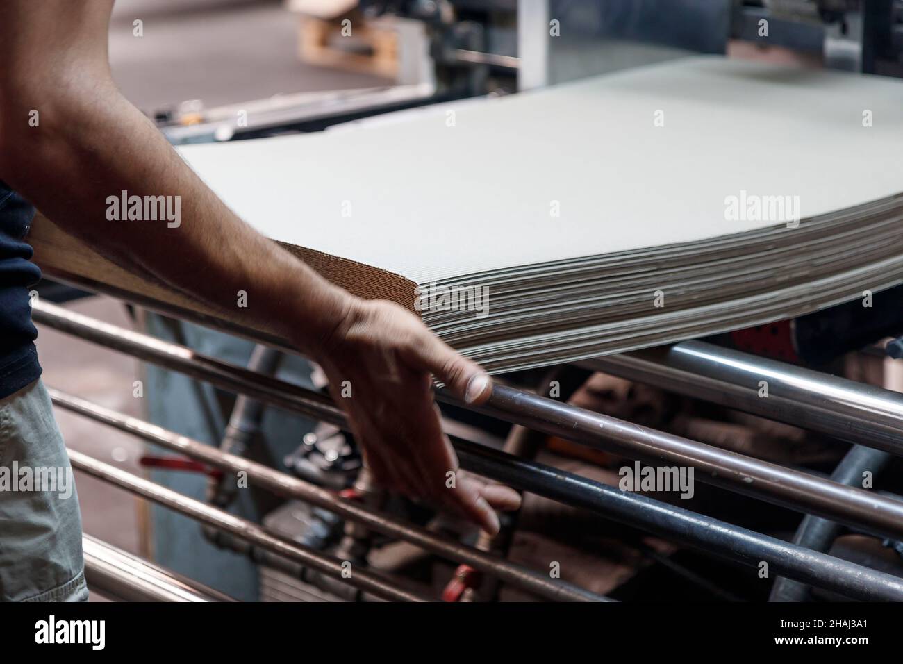 Industrial machinery at work inside a facility Stock Photo - Alamy