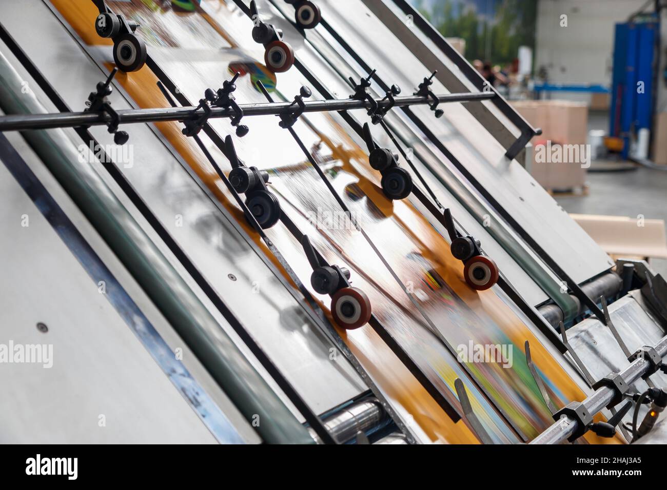 Industrial machinery at work inside a facility Stock Photo - Alamy