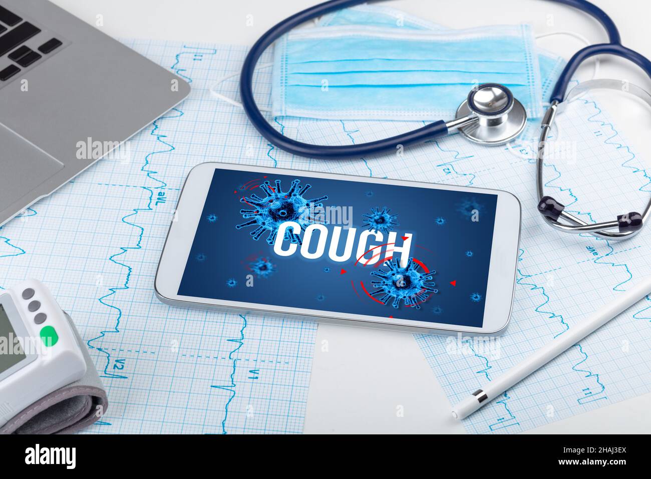 Tablet pc and doctor tools on white surface Stock Photo - Alamy