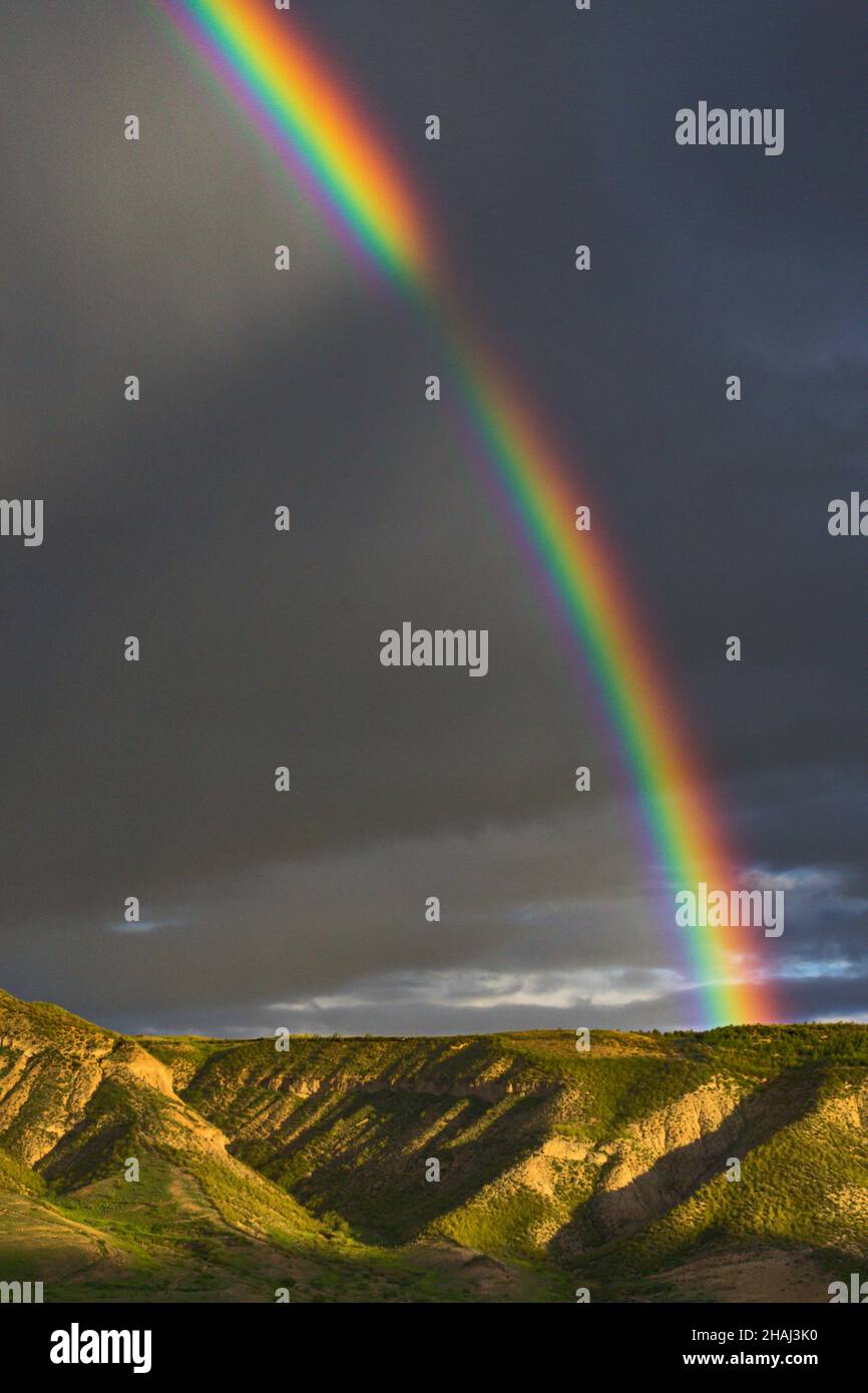 Rainbow in the Natural Landscape of the Badlands Stock Photo - Alamy