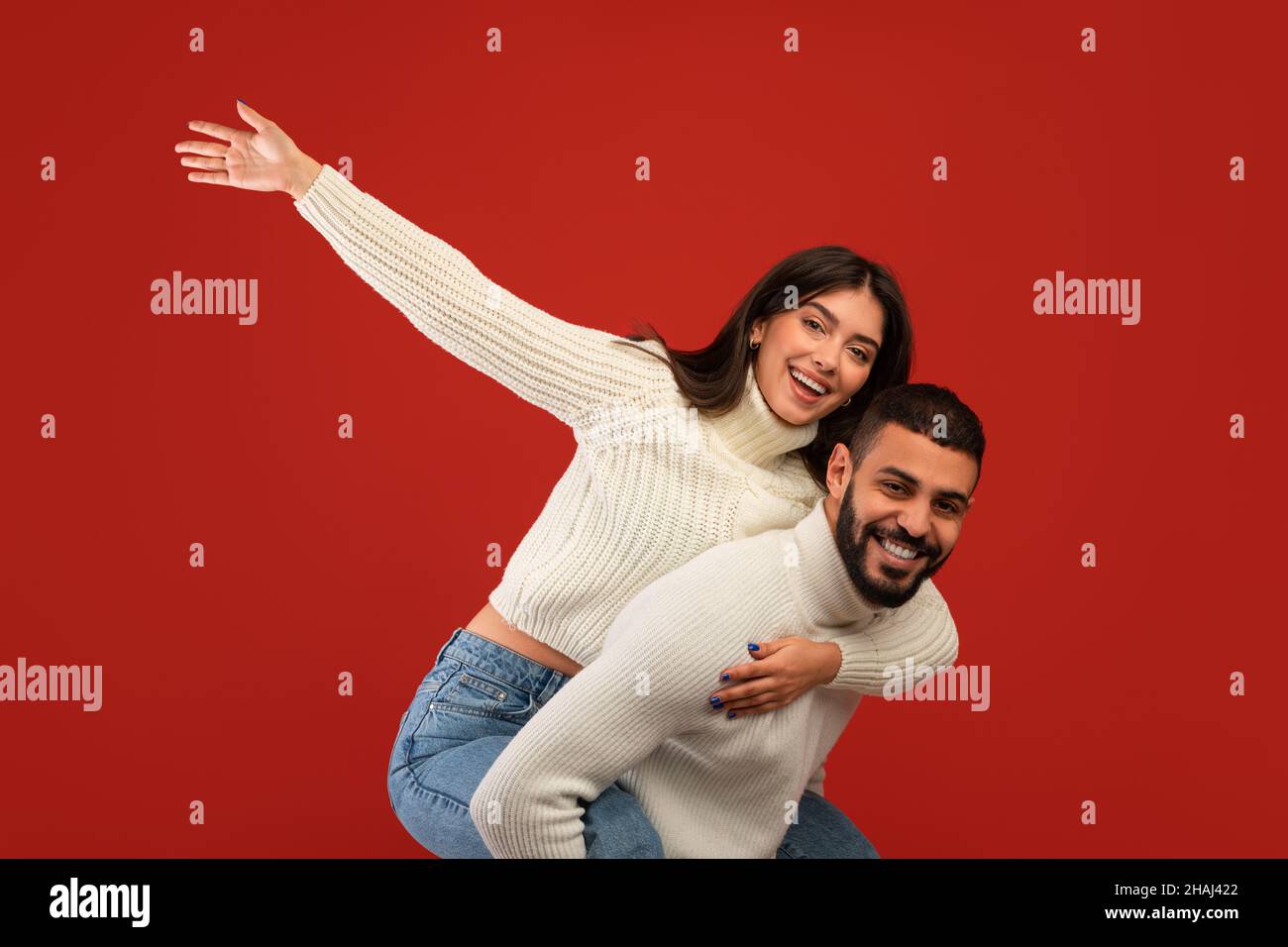 Romantic arab man piggybacking his lovely middle eastern girlfriend ...