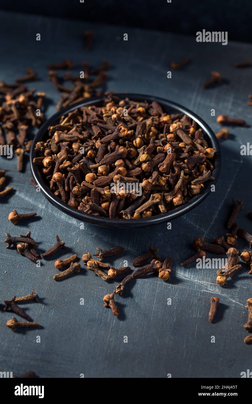 Dry Organic Whole Cloves in a Bowl Stock Photo - Alamy