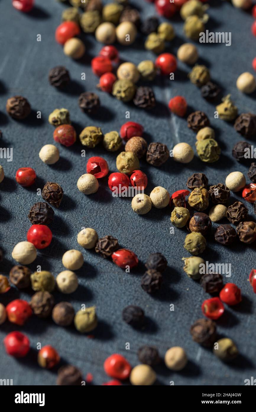 Raw Organic Dry Peppercorns in a Bowl Stock Photo - Alamy