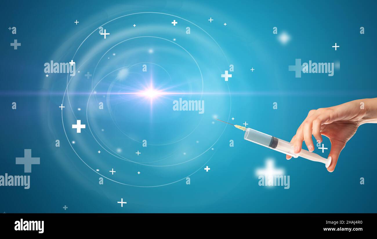 Syringe needle with virus vaccine Stock Photo - Alamy