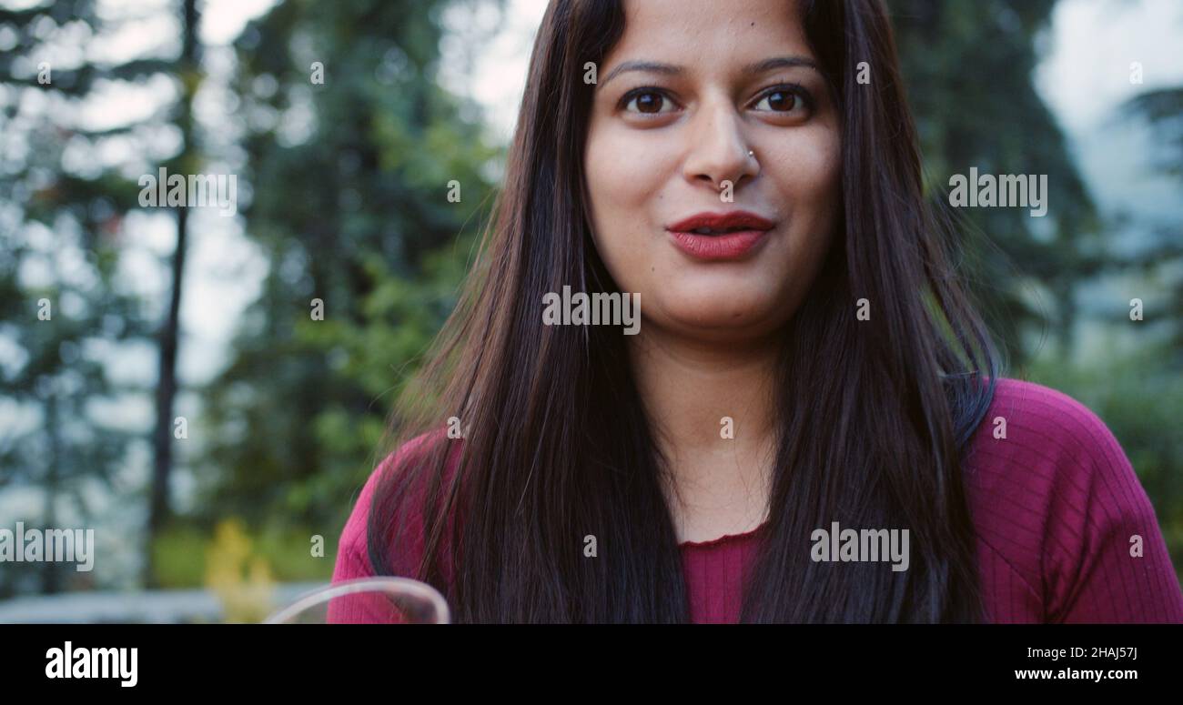 Portrait of a South Asian female looking straight forward Stock Photo ...