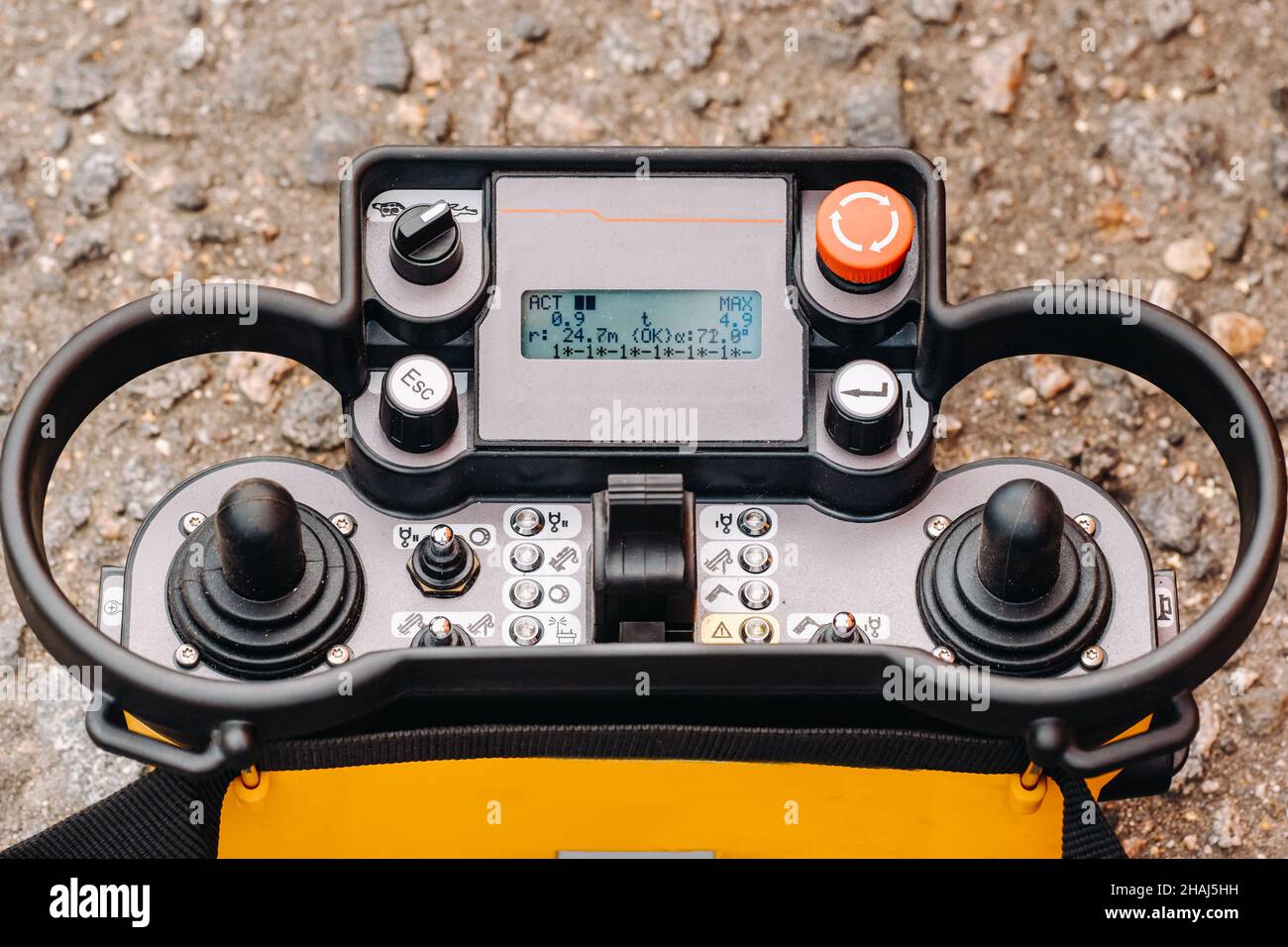 The control panel of the lifting car crane. A panel with joysticks and ...