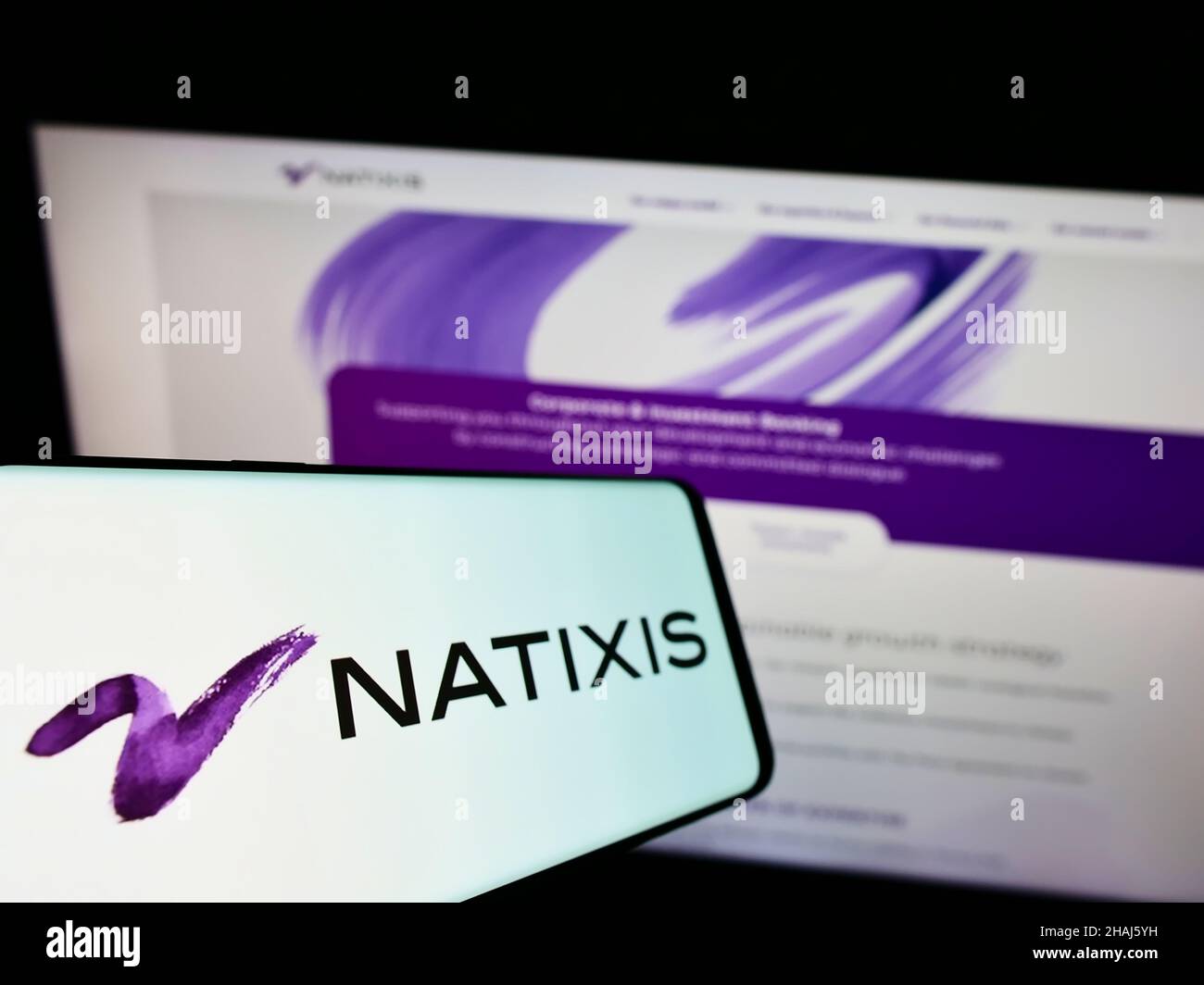 Smartphone with logo of French investment company Natixis S.A. on ...