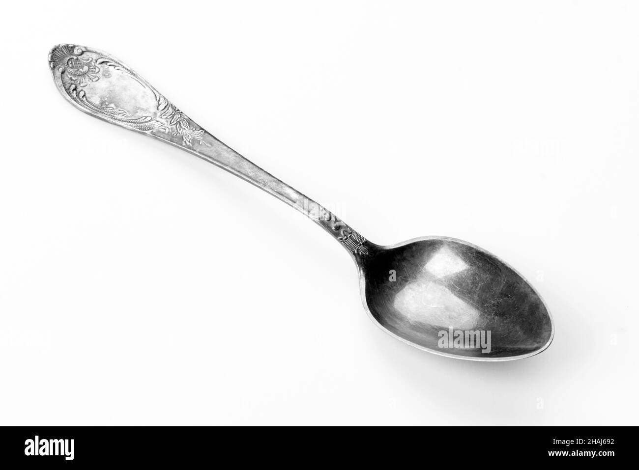 Beautiful teaspoon isolated on a white background Stock Photo - Alamy