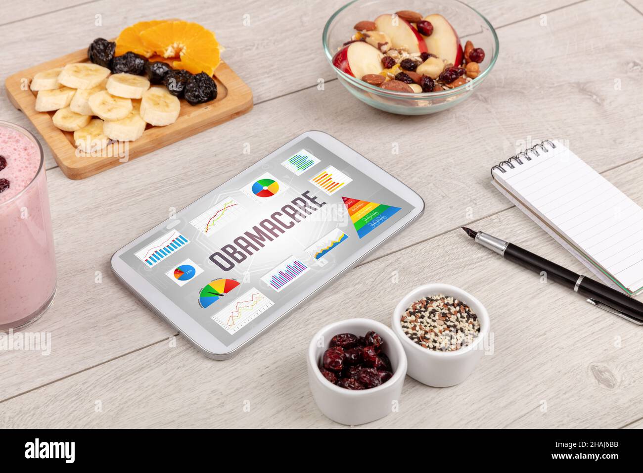 Organic food and tablet pc Stock Photo - Alamy
