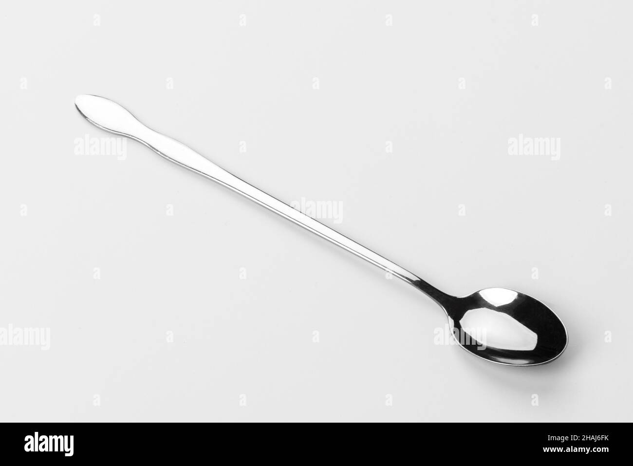 Beautiful teaspoon isolated on a white background Stock Photo - Alamy