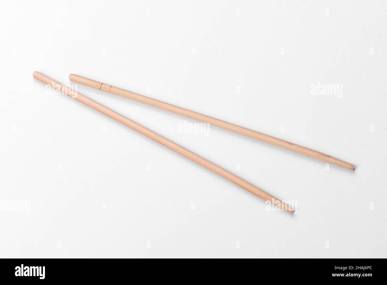 Beautiful sticks for sushi isolated on a white background. Cutlery on a ...
