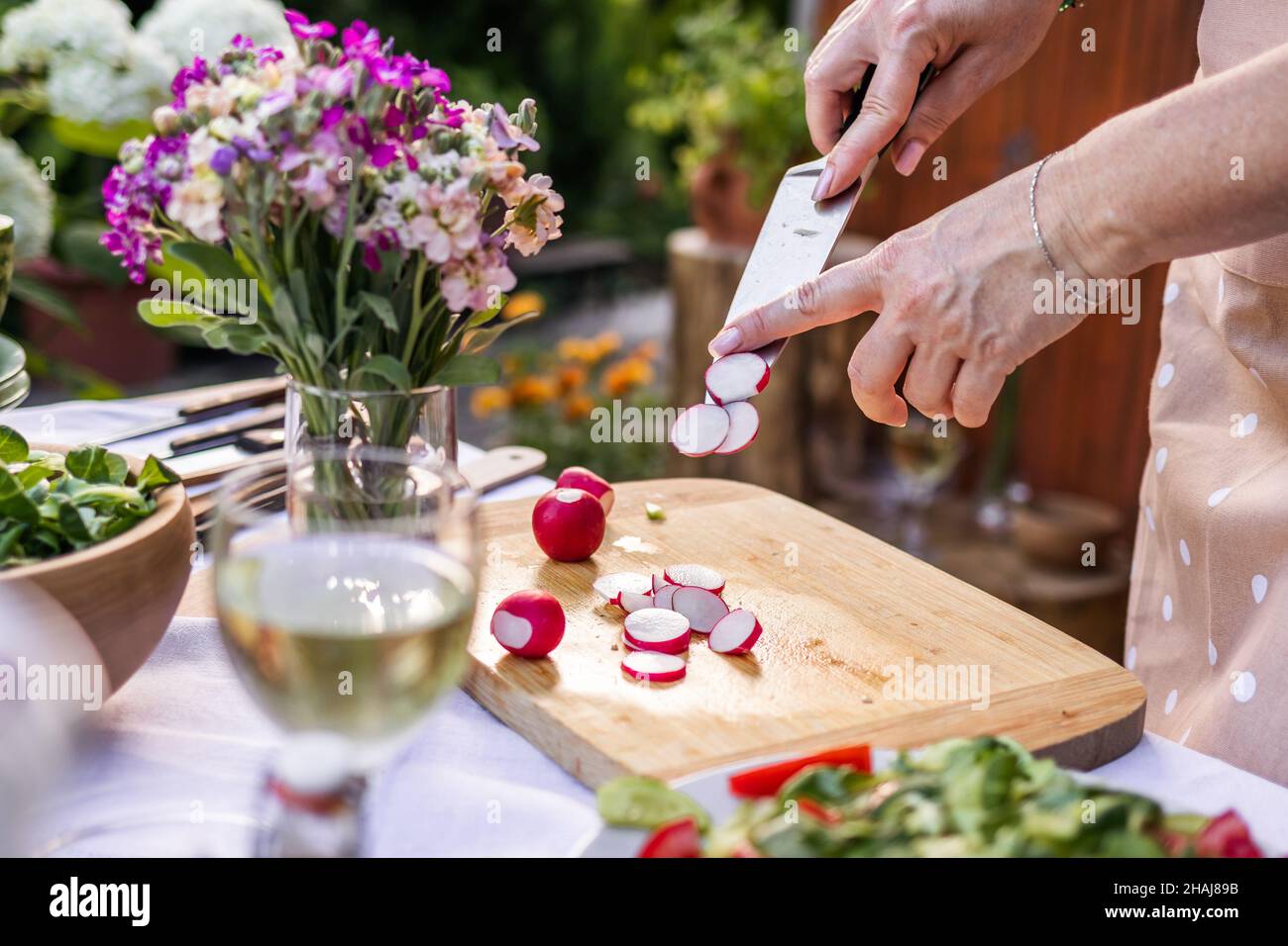 Chopping salad hi-res stock photography and images - Alamy