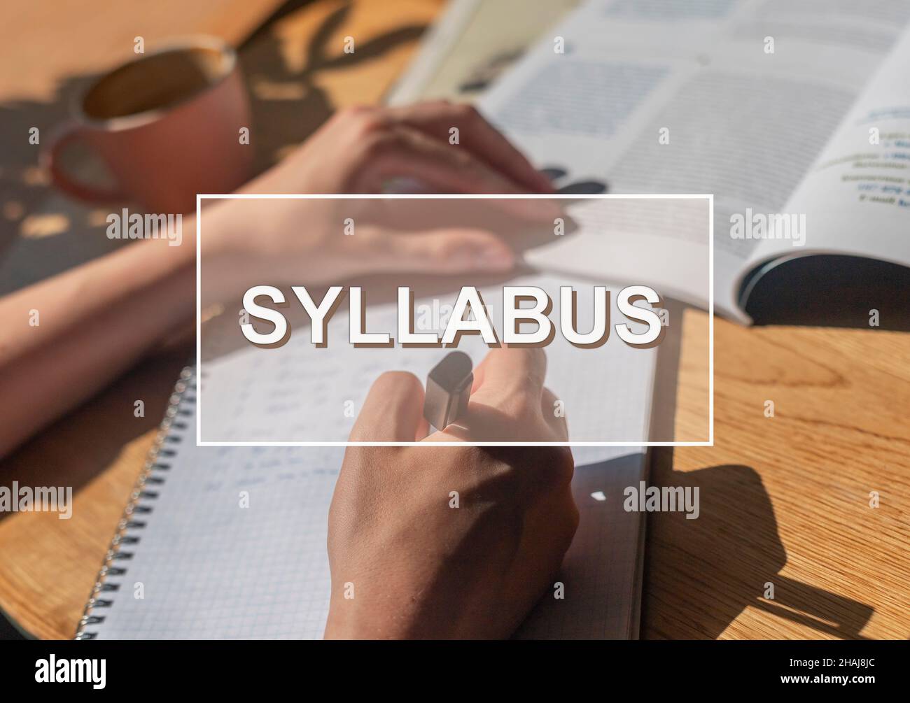 Syllabus word over photo with hand closeup writing in notebook Stock ...