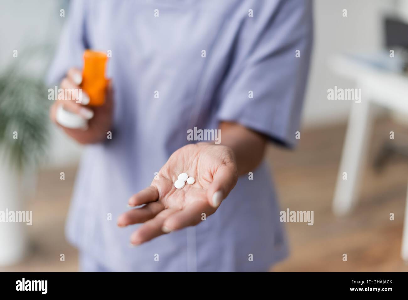 Nurse hold hand elderly woman hi-res stock photography and images - Alamy