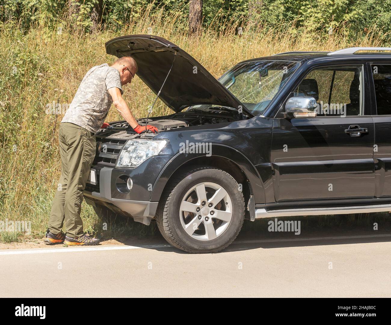 Modern car hood service hi-res stock photography and images - Alamy