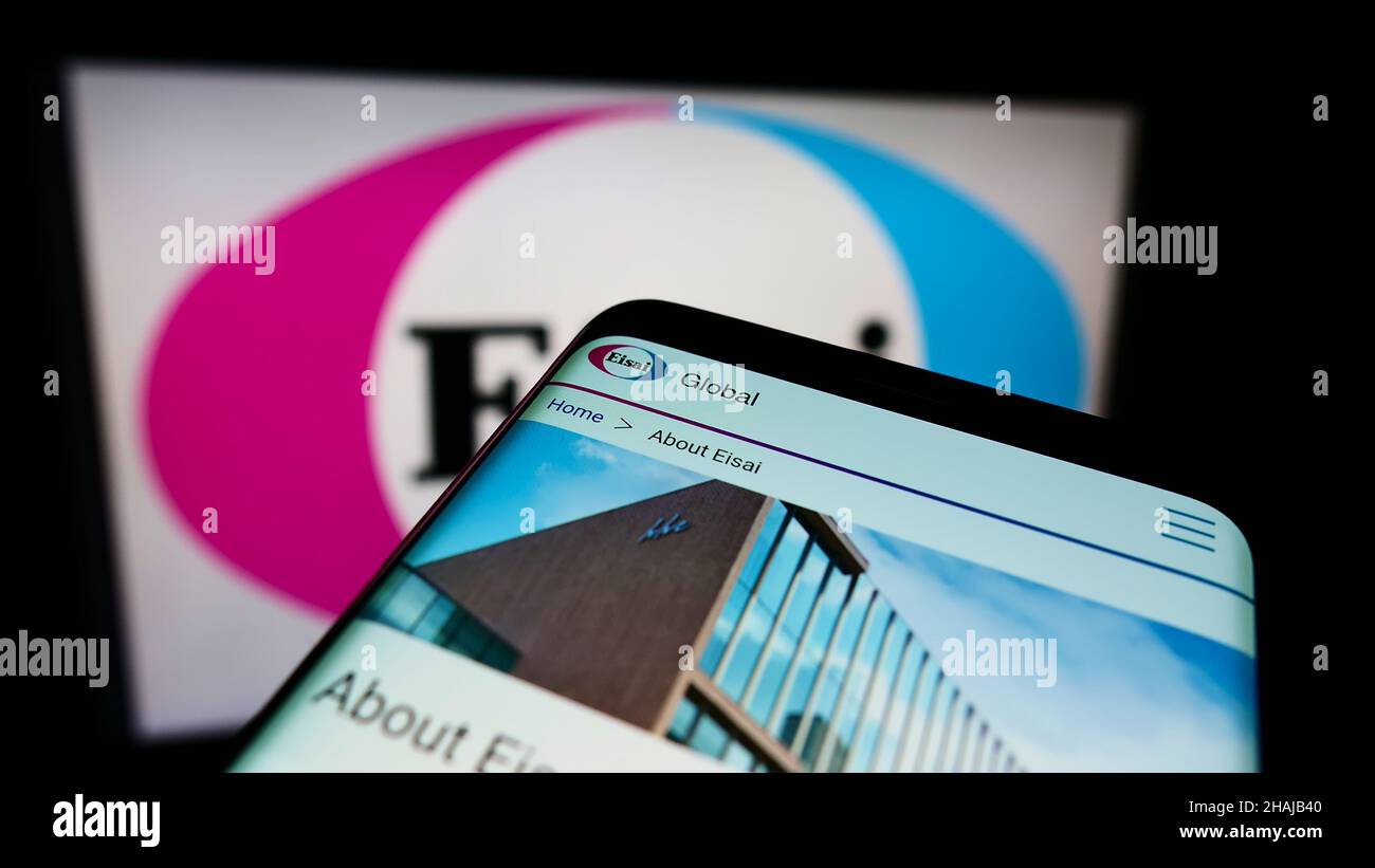 Smartphone with website of Japanese pharmaceutical company Eisai Co ...