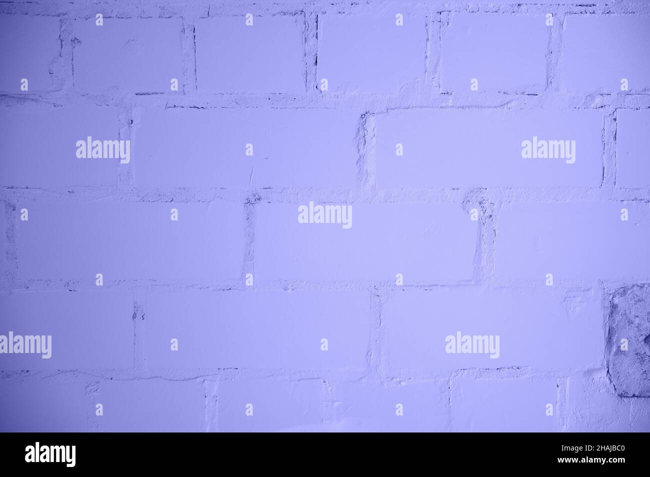 Brick wall texture background colored in trendy violet color Stock ...