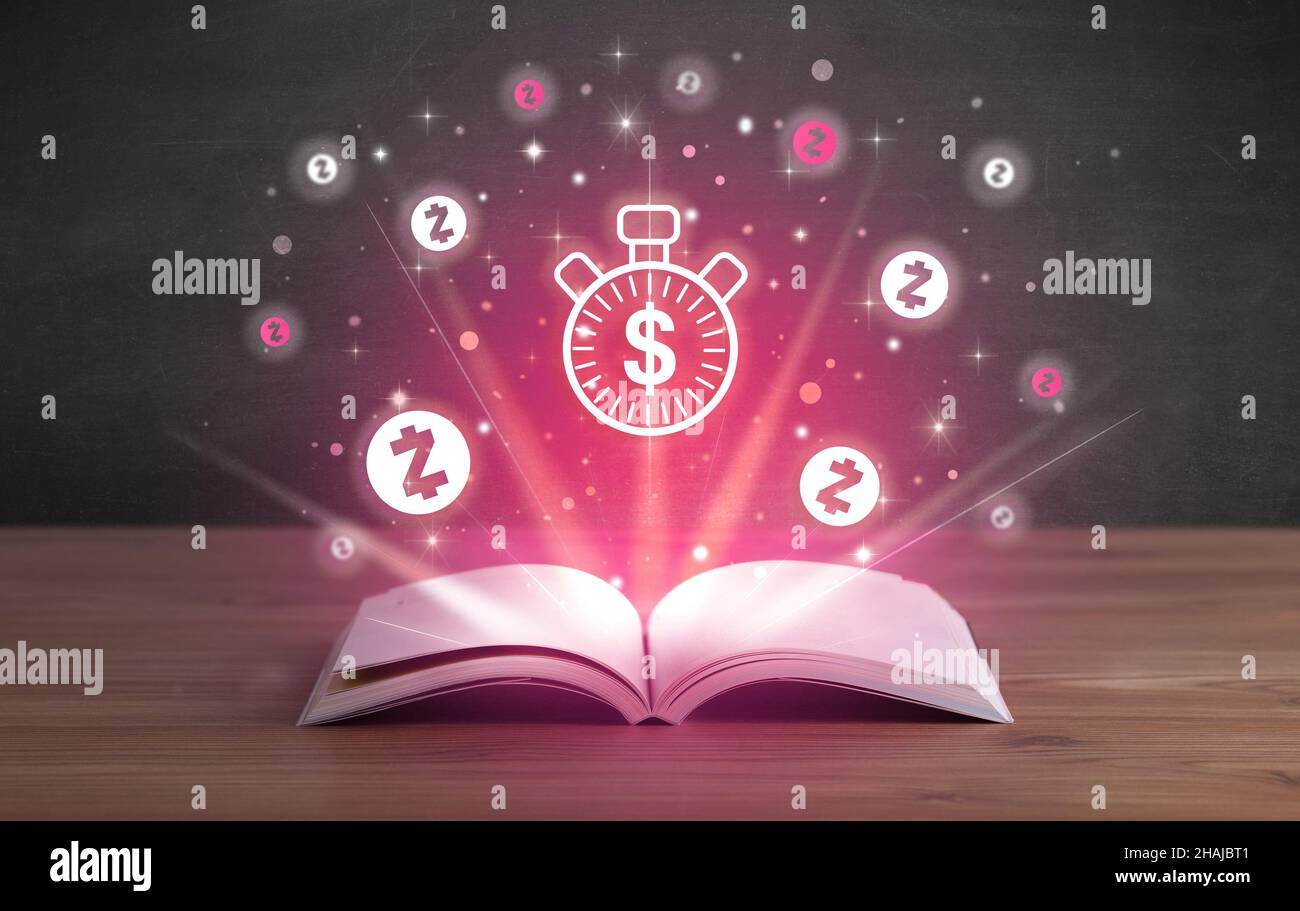 Open book with currency icons above Stock Photo - Alamy
