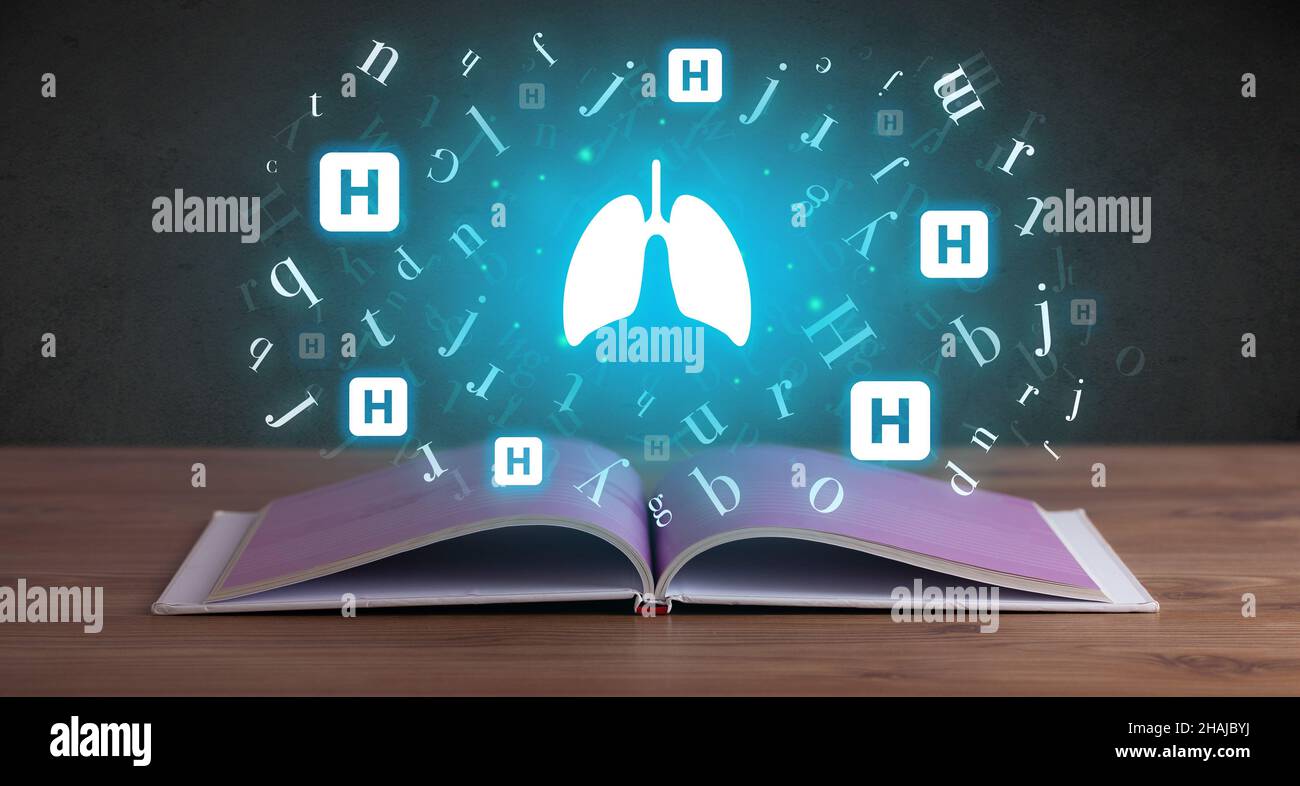 Open medical book with health icons above Stock Photo - Alamy
