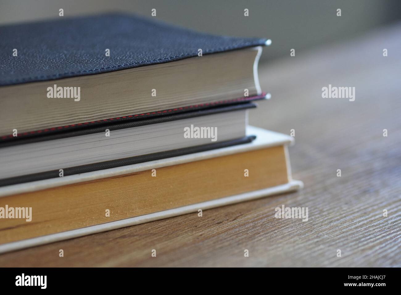 Stack of three books hi-res stock photography and images - Alamy