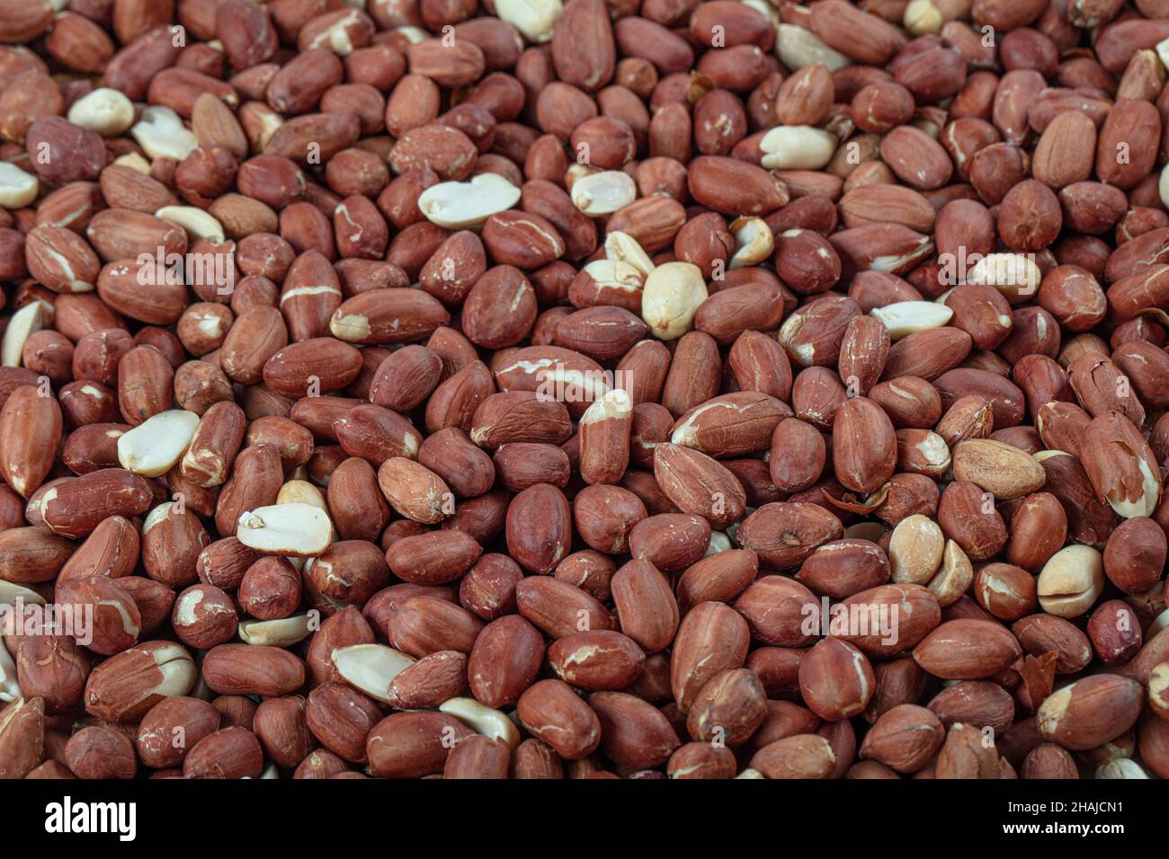 Peanut snack groundnut background pattern. Closeup whole peanut ...