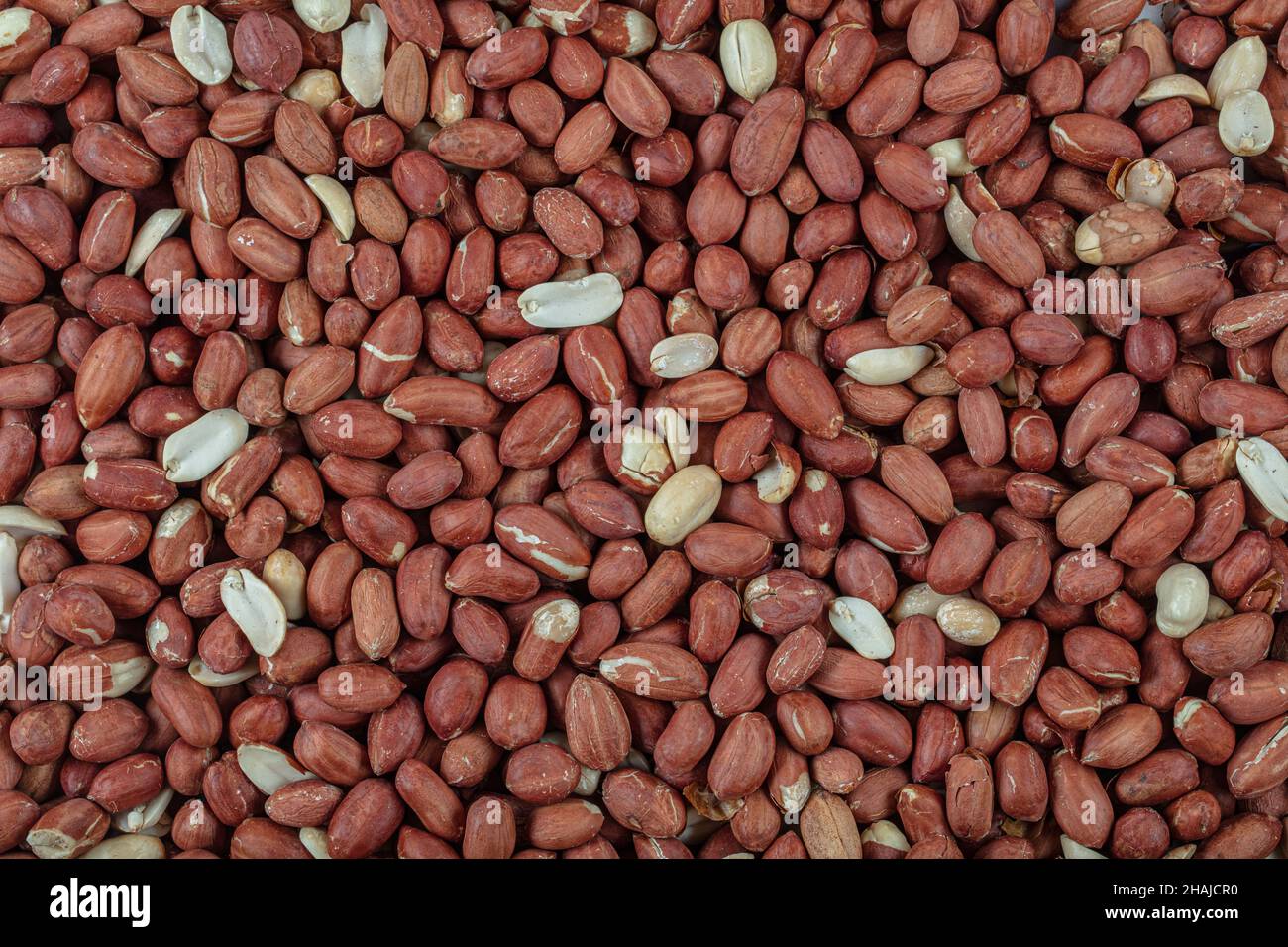Peanut snack groundnut background pattern. Closeup whole peanut ...